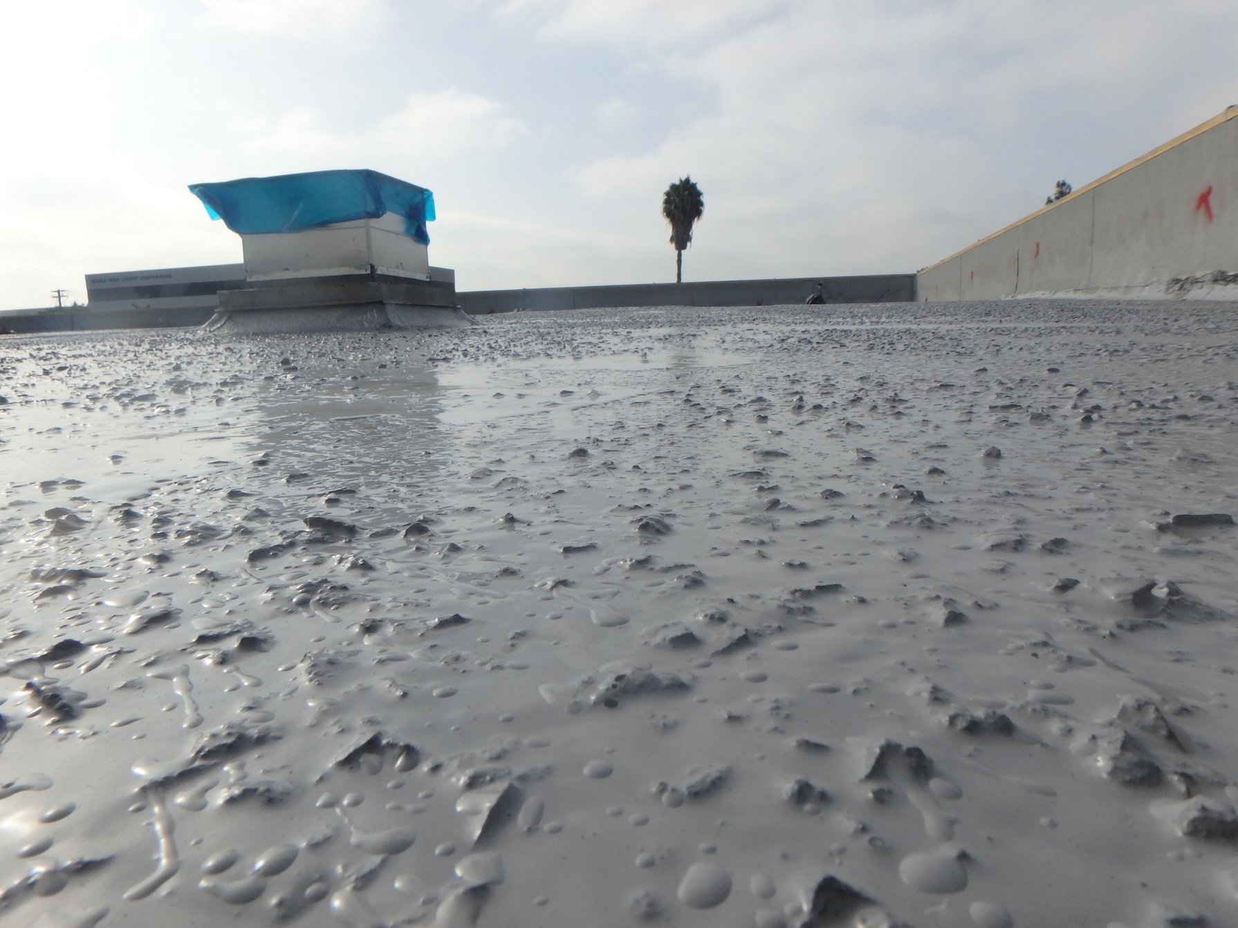 60-80% Labor Savings On Tar & Gravel Roof Coating Projects